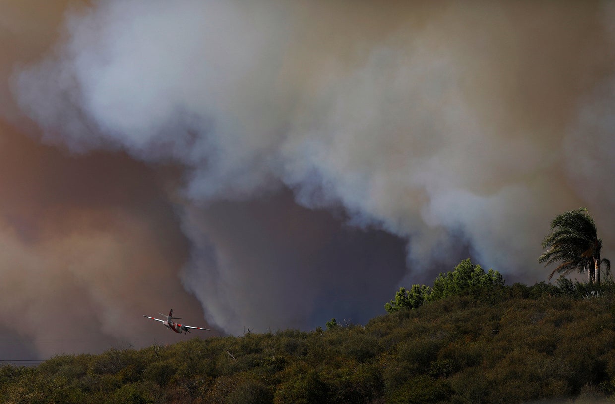 Wildfires tear through Northern, Southern California: Images of Camp ...