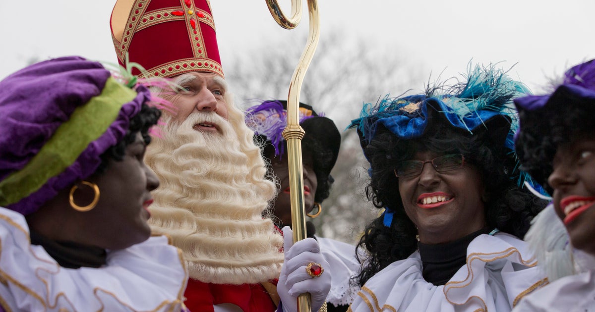 Protests to greet Dutch Santa and his black-faced sidekick - CBS News