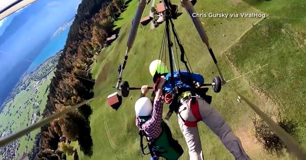 WATCH: Sheer Terror As Man Dangles From Hang Glider After Pilot Forgets ...