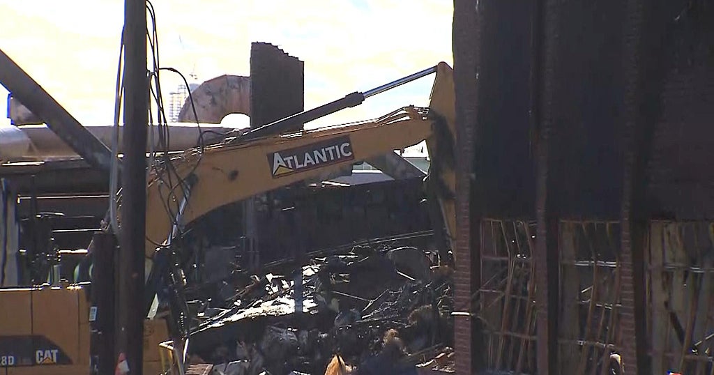 Demolition Begins After East Boston Fire Leaves Family-Owned Casket ...