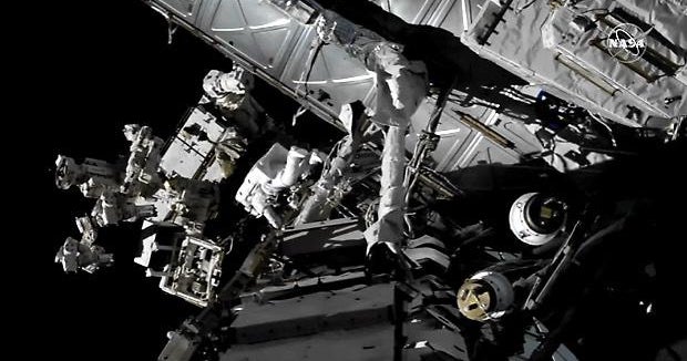ISS spacewalk: Astronauts try to fix battery problem, run cables ...