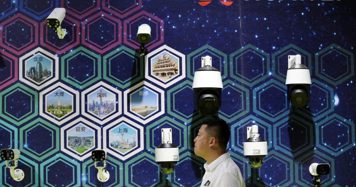 Huawei v. Donald Trump: Ban on China's Huawei fans trade war flames ...