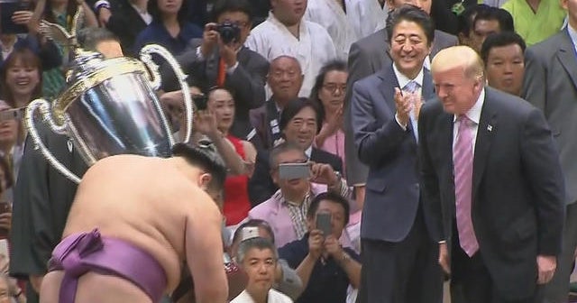 Trump spends first full day in Japan with Shinzo Abe - CBS News