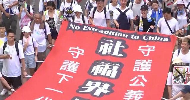 Chinese extradition bill spurs mass protests in Hong Kong - CBS News