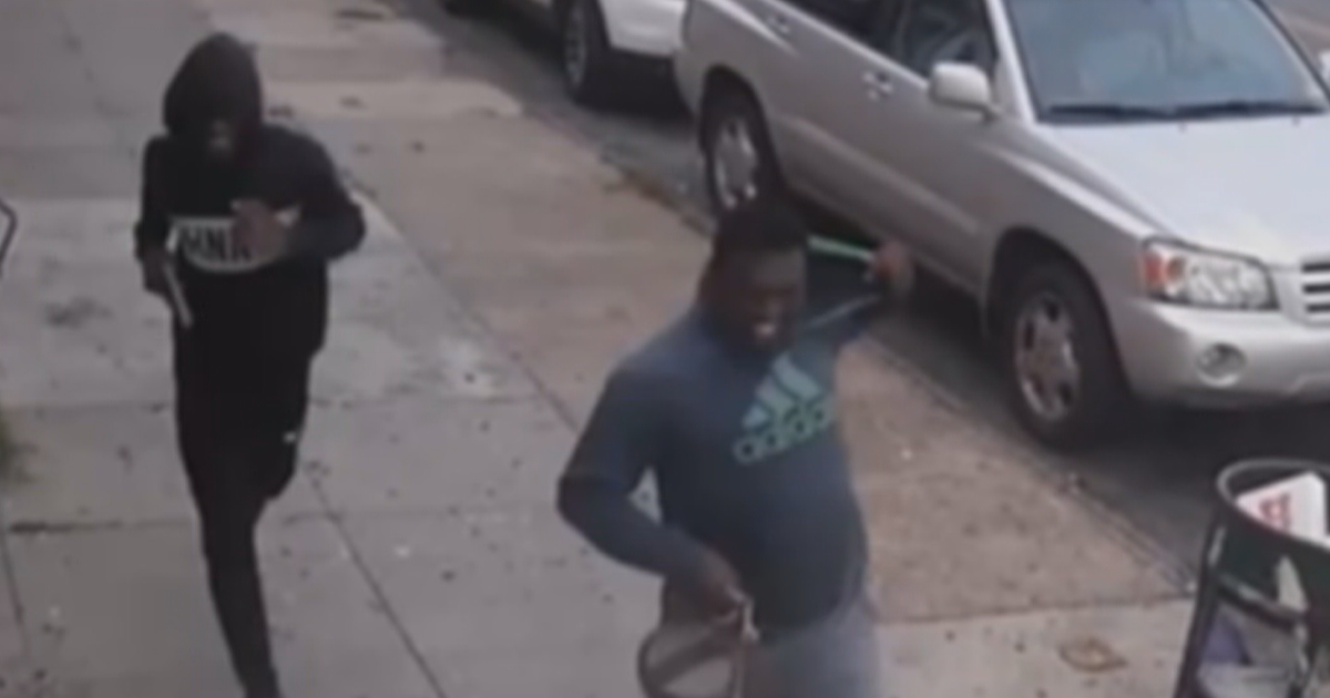 Surveillance Video Captures 2 Men Stealing Womans Purse At Gunpoint In