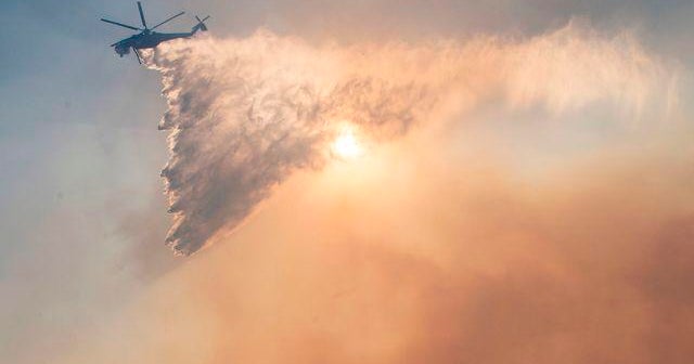 Fighting the wildfire in Simi Valley, California - CBS News