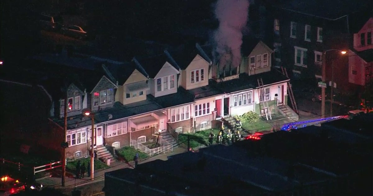 Smoke Pours From Second-Floor Windows As Fire Crews Battle Blaze In ...