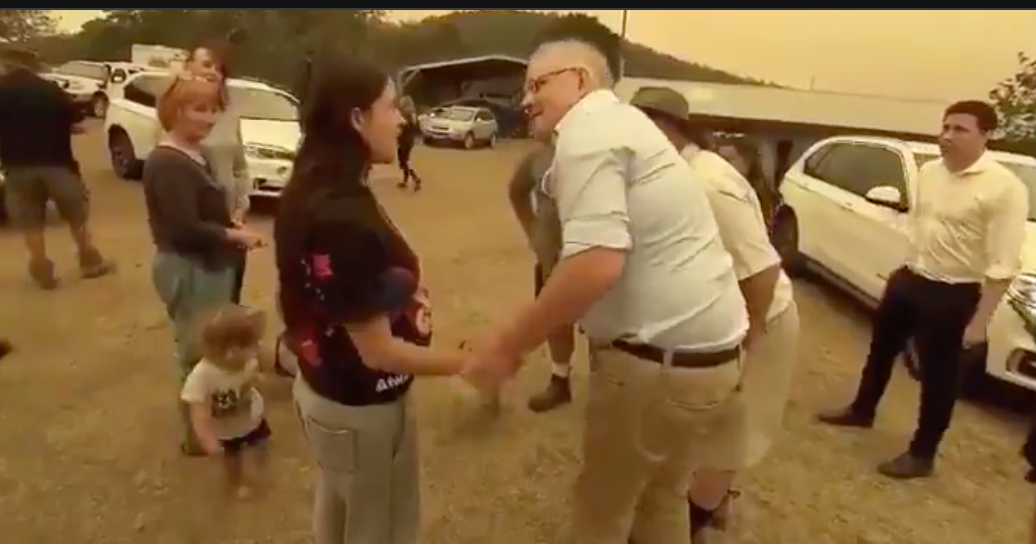 Australia fires: Woman forced to shake Prime Minister Scott Morrison ...