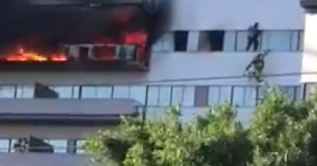 8 injured in Los Angeles high-rise fire - CBS News