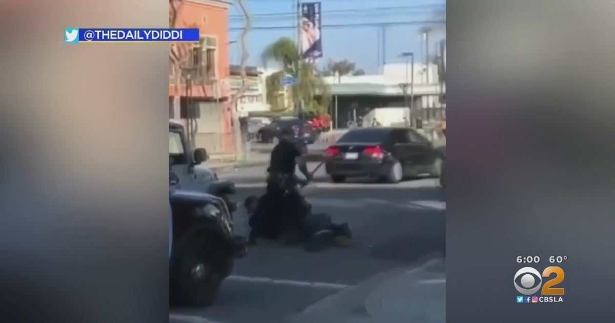 Caught On Camera Long Beach Officer Striking Suspect With Baton