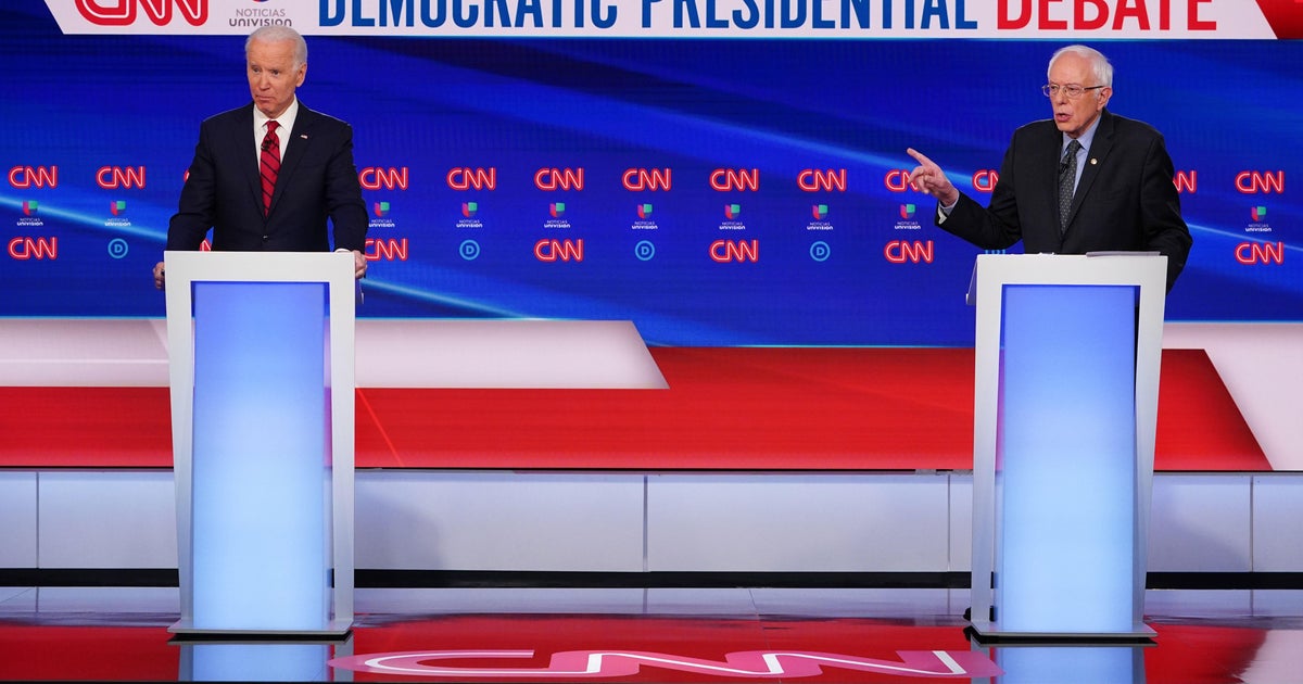 Coronavirus takes center stage at Democratic debate - CBS News