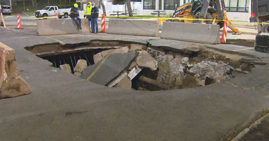 Brockton DPW Truck Falls Into Hole After Culvert Collapses - CBS Boston