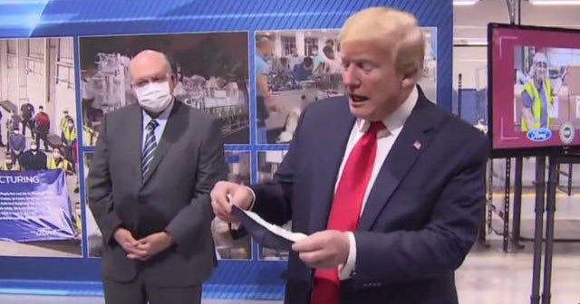 Trump visits Ford factory without face mask despite company policy ...