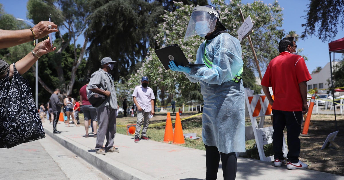 U.S. reports a record 60,000 new coronavirus cases in one day - CBS News