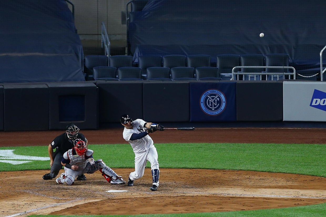 MLB commissioner confident league will get through season as more ...