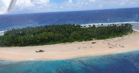 3 men rescued from tiny Pacific island after writing giant SOS in sand ...