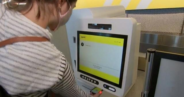 Airports turn to touchless technology during coronavirus pandemic - CBS ...