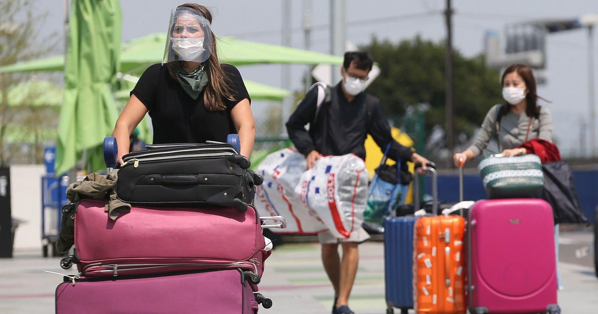 Fully vaccinated people may safely resume travel, CDC says - CBS News