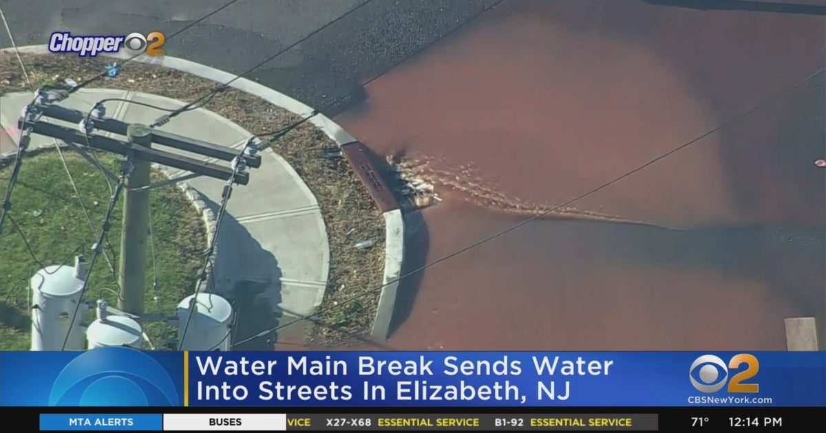 Brown Water Flows Through Streets Of Elizabeth, N.J. After Water Main ...