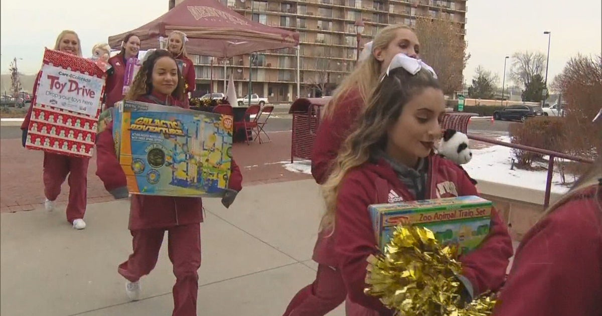 DU cheer squad leads community effort to collect toys - CBS Colorado