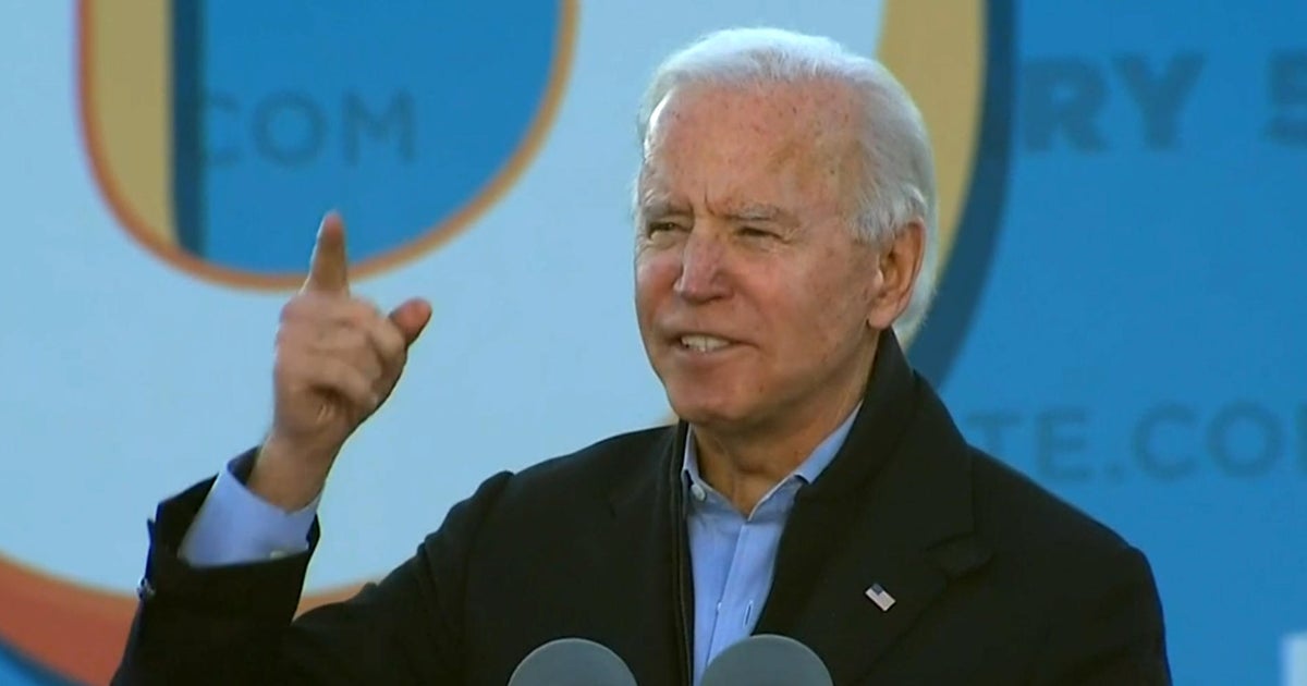 Biden holds rally in Georgia on eve of runoff elections - CBS News
