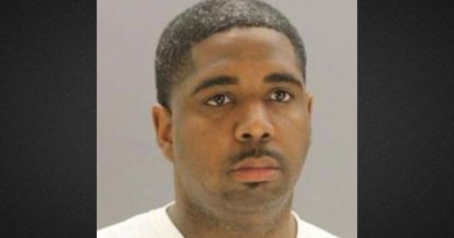Dallas officer arrested on 2 murder charges - CBS News