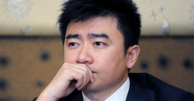 Chinese journalist remains detained without explanation - CBS News