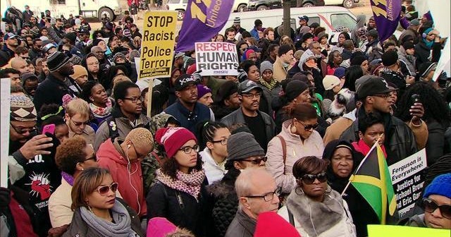 Protesters march with message against excessive force - CBS News