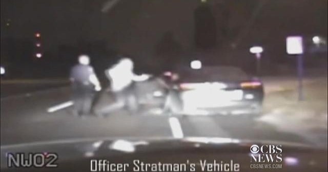 Shootout between police and gunman caught on camera - CBS News