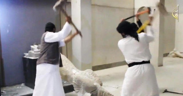 ISIS destroys ancient artifacts in Mosul - CBS News