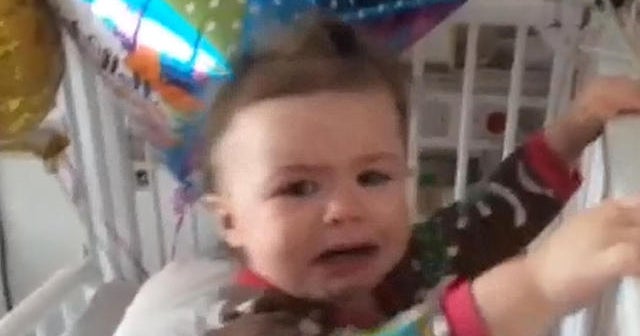 Baby Lily who survived icy river crash returns home - CBS News