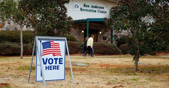 Why Georgia's new voting law is being compared to Jim Crow - CBS News