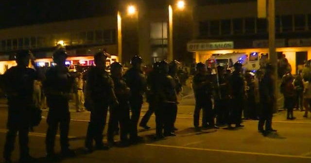 Tensions after confrontations overnight in Ferguson - CBS News