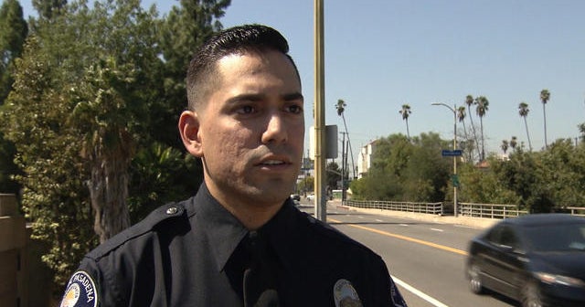Rookie cop saves life of 12-year-old who intended to jump off bridge ...