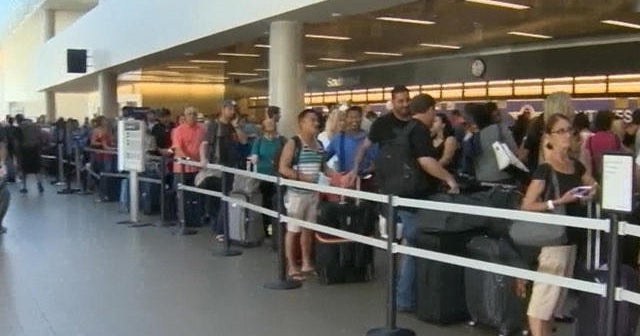 Americans are flying less and less each year - CBS News