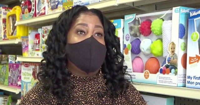 Toy store owner gives back to community - CBS News