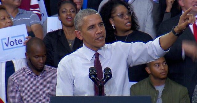 Obama interrupted by protester during rally in North Carolina - CBS News
