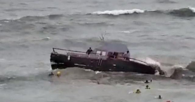 Suspected human-smuggling boat capsizes, killing at least 3 - CBS News