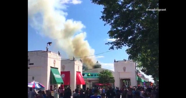 Carousel roof catches fire at New York amusement park - CBS News
