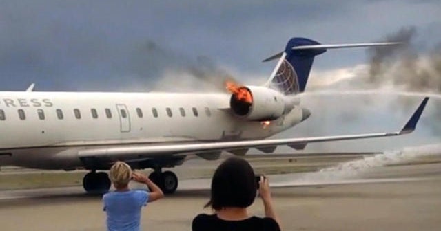 SkyWest jet engine catches fire after landing in Denver - CBS News