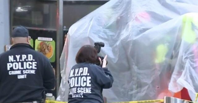 Times Square shooting suspect taken into custody - CBS News