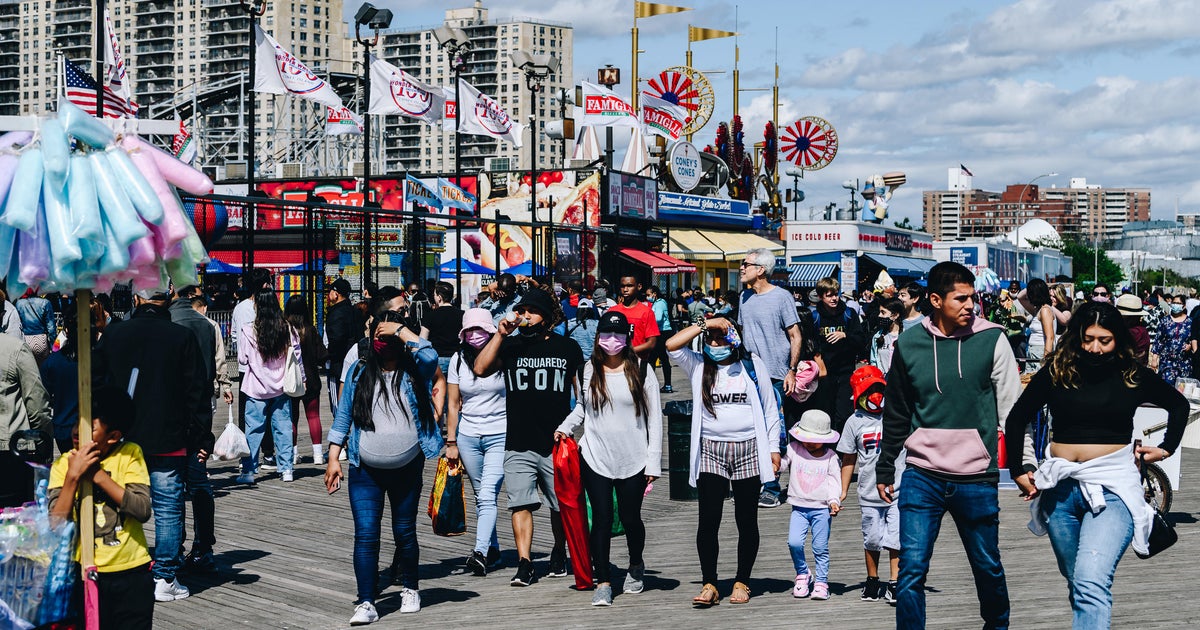 Americans begin transition into post-pandemic life as more are ...