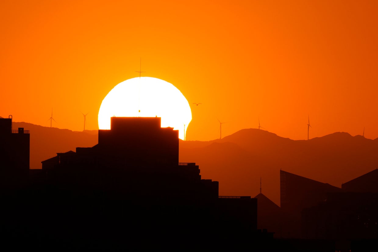 Rare "ring of fire" solar eclipse captured in spectacular photos from ...