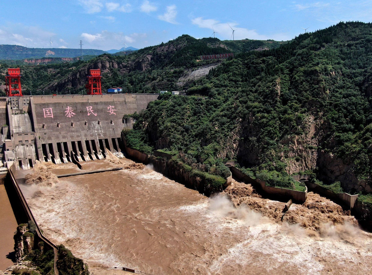 At least 25 dead as torrential rain floods Chinese city, trapping ...