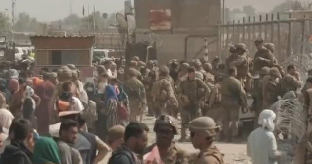 Americans in Afghanistan face hard choice of dividing their families ...