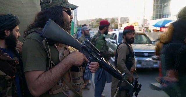 Taliban armed with U.S. weapons faces threat from ISIS-K - CBS News