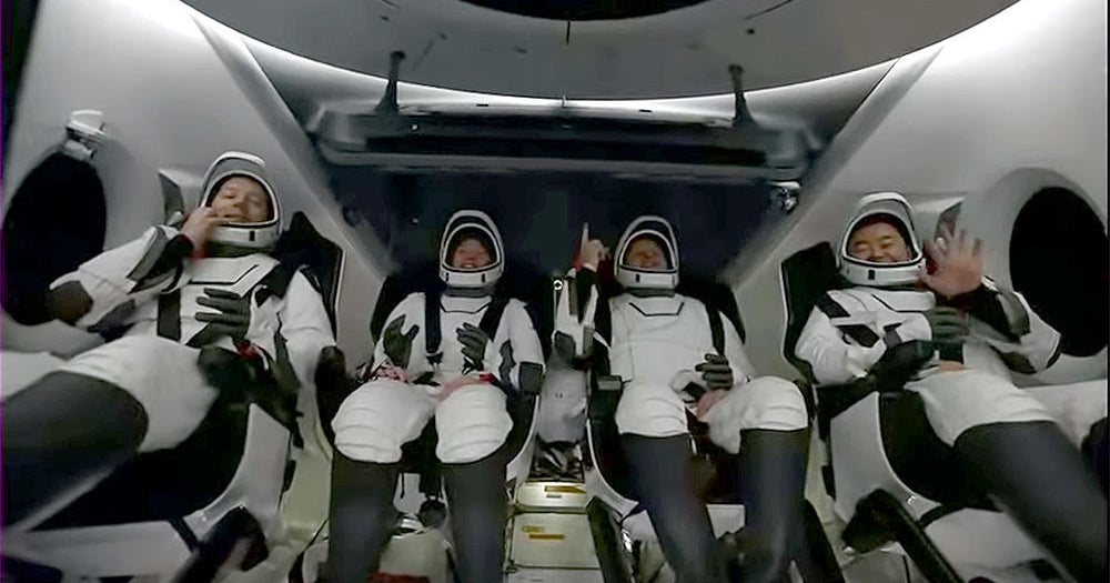 Space station crew returns to Earth with spectacular night re-entry ...