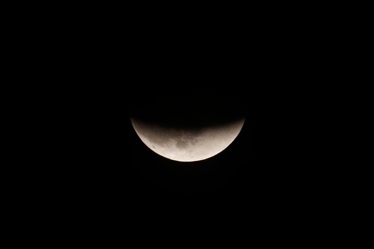 Stunning images of longest partial lunar eclipse since 1440