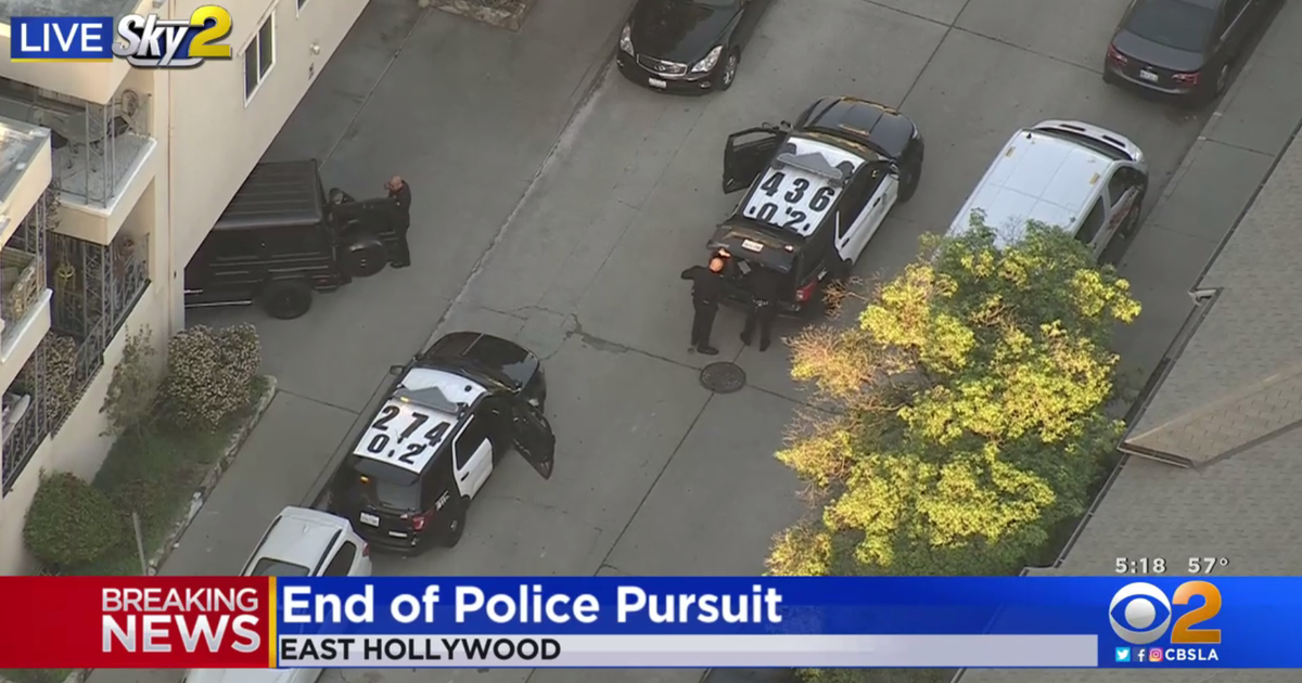 LAPD Officers Take Robbery Suspect Into Custody Following Pursuit - CBS Los Angeles