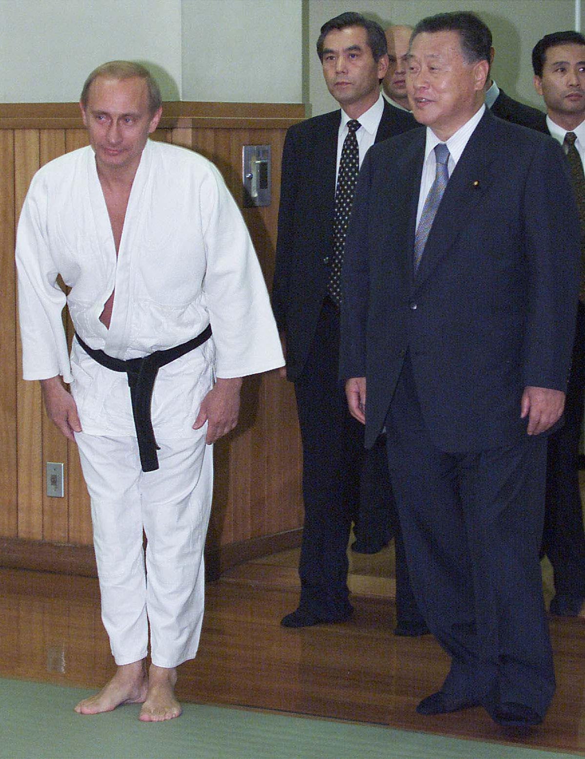 Vladimir Putin stripped of his taekwondo black belt over Ukraine ...